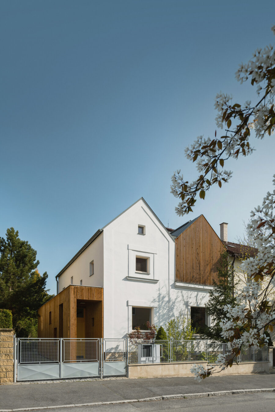 Seeing Double: Twin-Gabled Structures Unite This Family Home