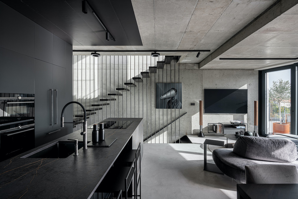 Concrete Canvas: Brutalist Forms Connect Three Creative Living Spaces